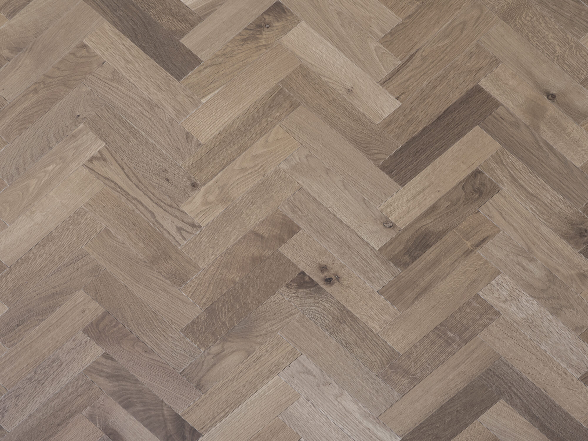 15 x 70 x 280mm Light Smoked & Oiled Herringbone Flooring